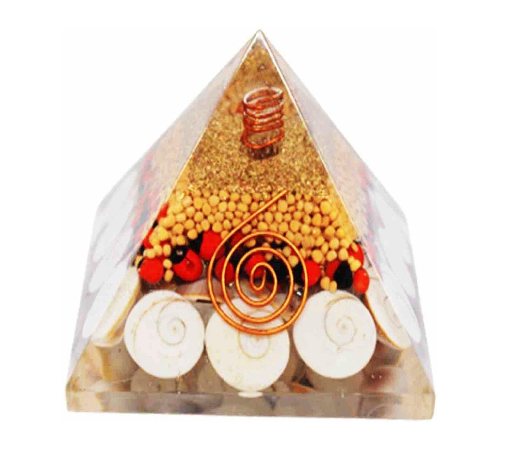 Gomti Chakra Orgone Pyramid with Red & White Chirmi Seeds ...